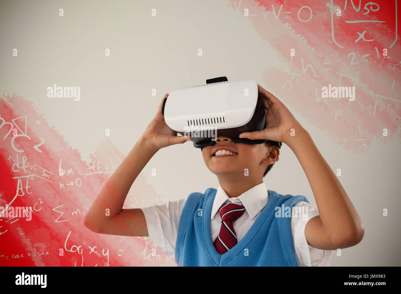 Digital image of equations against schoolboy using virtual reality ...