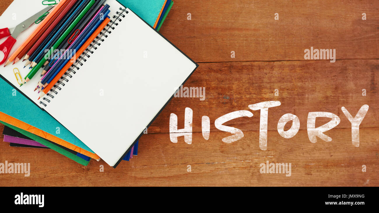 History text against white background against overhead view of books ...