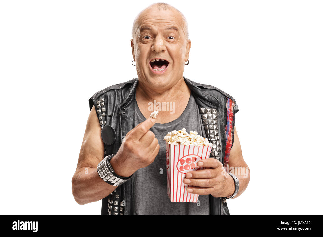Elderly punker having popcorn and laughing isolated on white background ...
