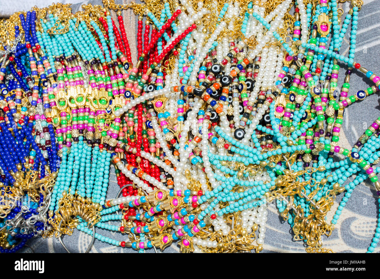 Colorful beads of various color at a market Stock Photo - Alamy