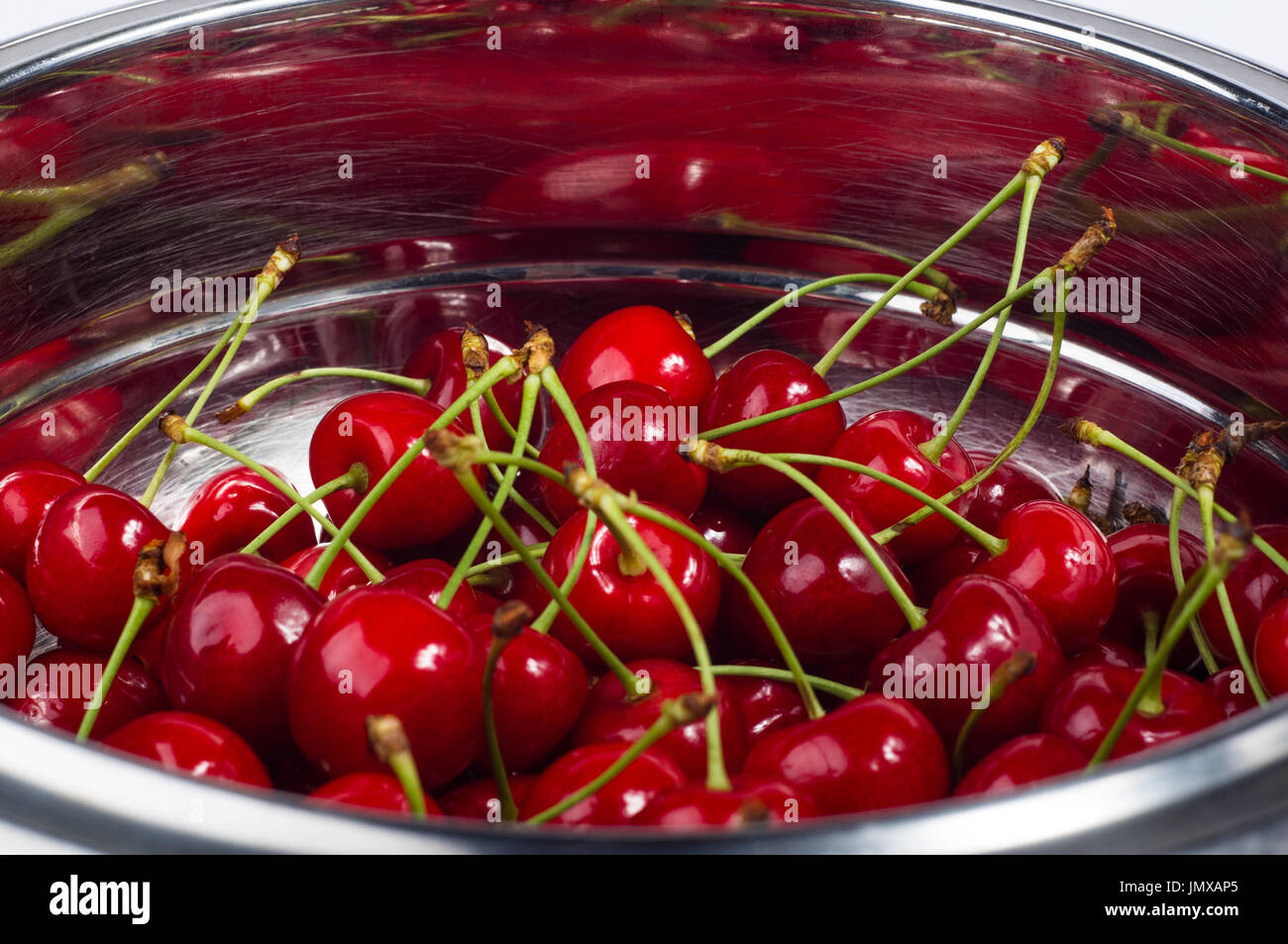 large ripe red cherries in a dish of stainless steel, close-up Stock ...