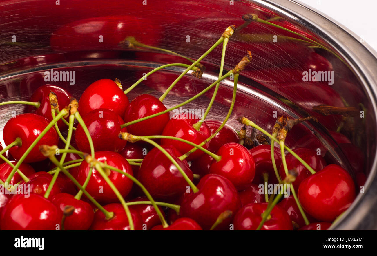 large ripe red cherries in a dish of stainless steel, close-up Stock ...