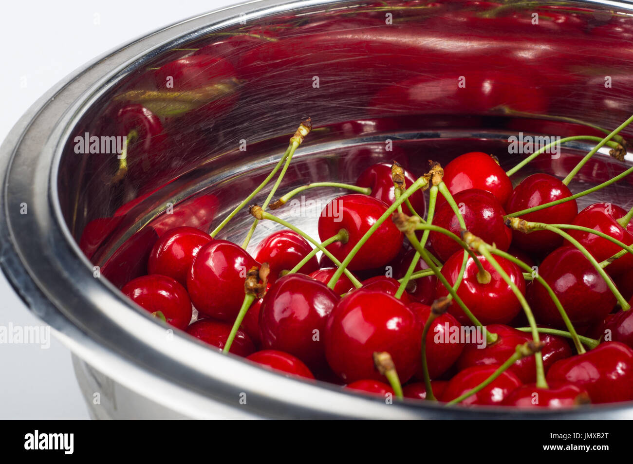 large ripe red cherries in a dish of stainless steel, close-up Stock ...