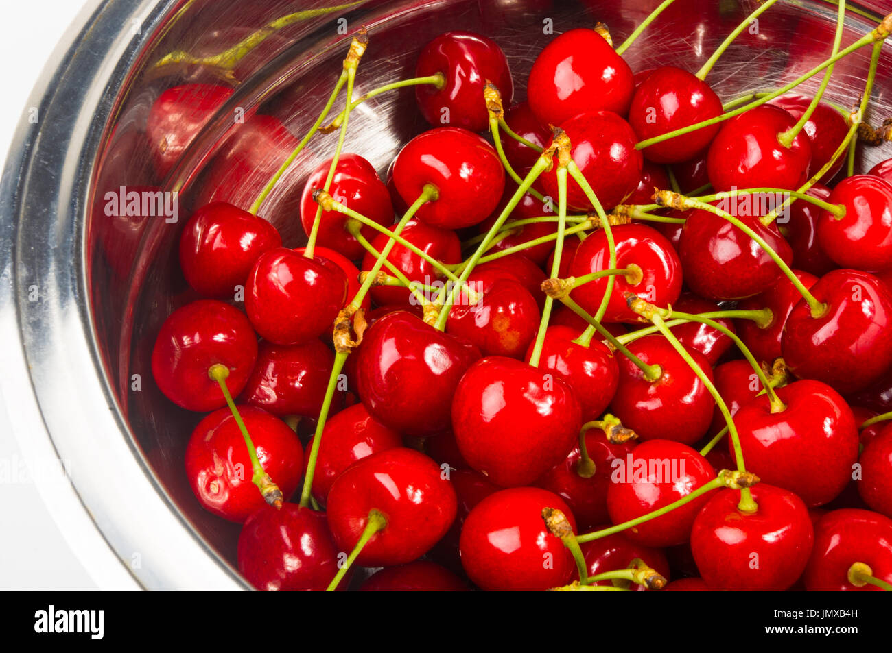 large ripe red cherries in a dish of stainless steel, close-up Stock ...