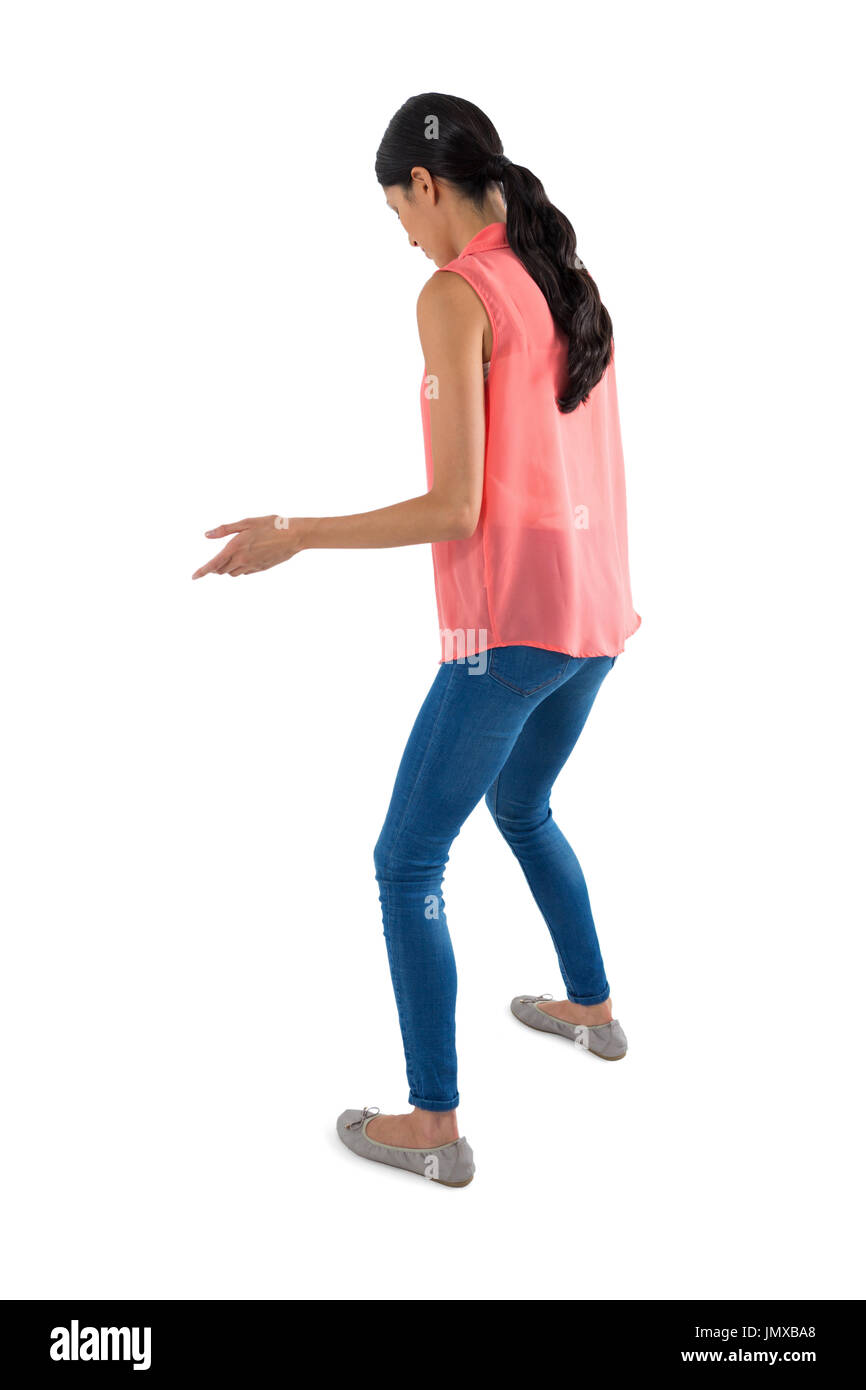 Attractive woman standing on white background Stock Photo - Alamy