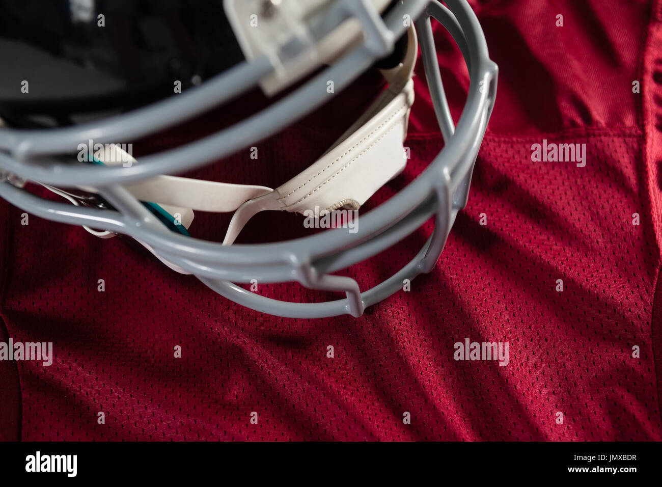 Maroon helmet hi-res stock photography and images - Alamy