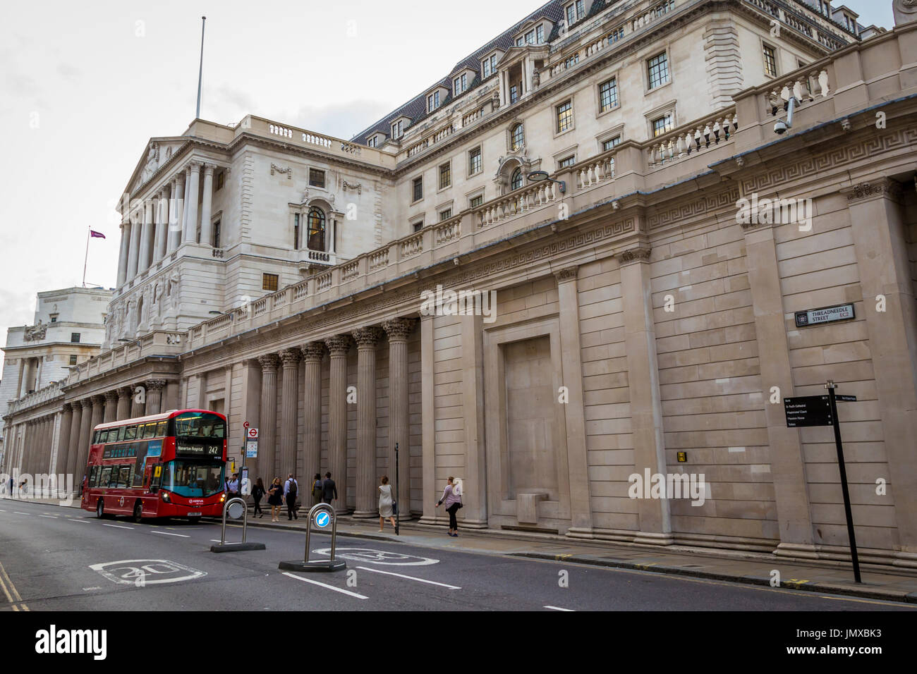 Bank of England. London, United Kingdom. People and a London bus ...