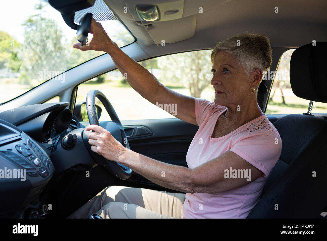 Adjusting the rear view mirror of a car hi-res stock photography and ...