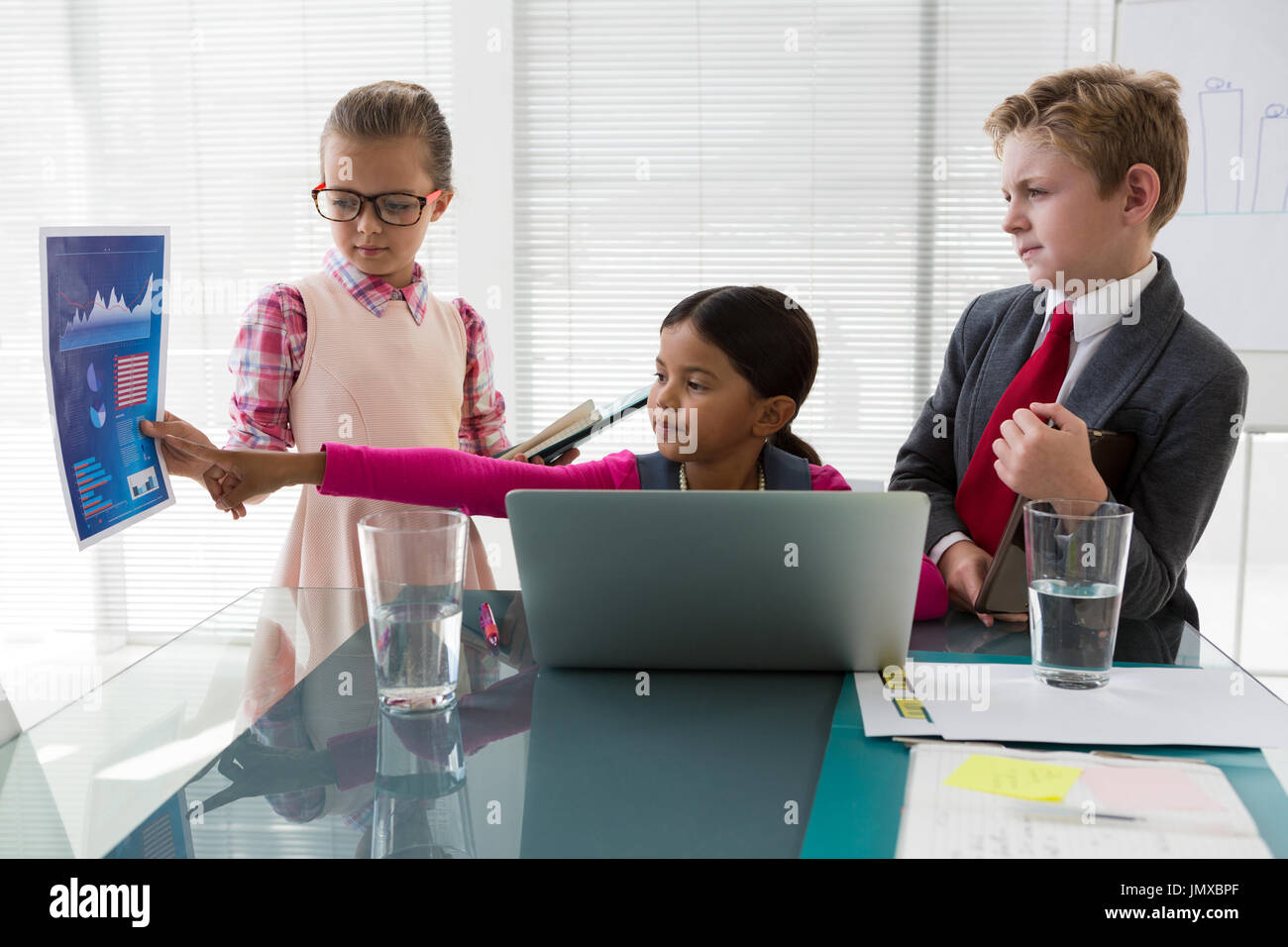 Kids business executives interacting hi-res stock photography and ...