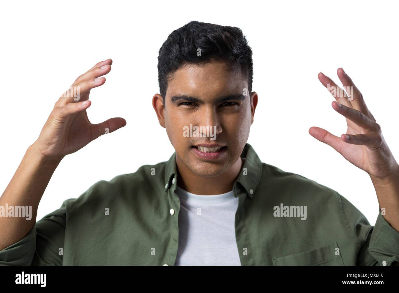 Frustrated man gesturing against white background Stock Photo - Alamy
