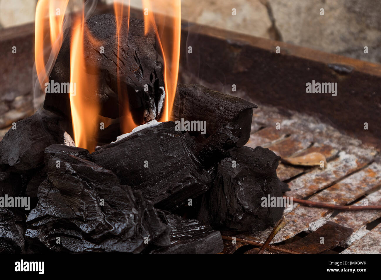 Pieces of burning coal Stock Photo - Alamy