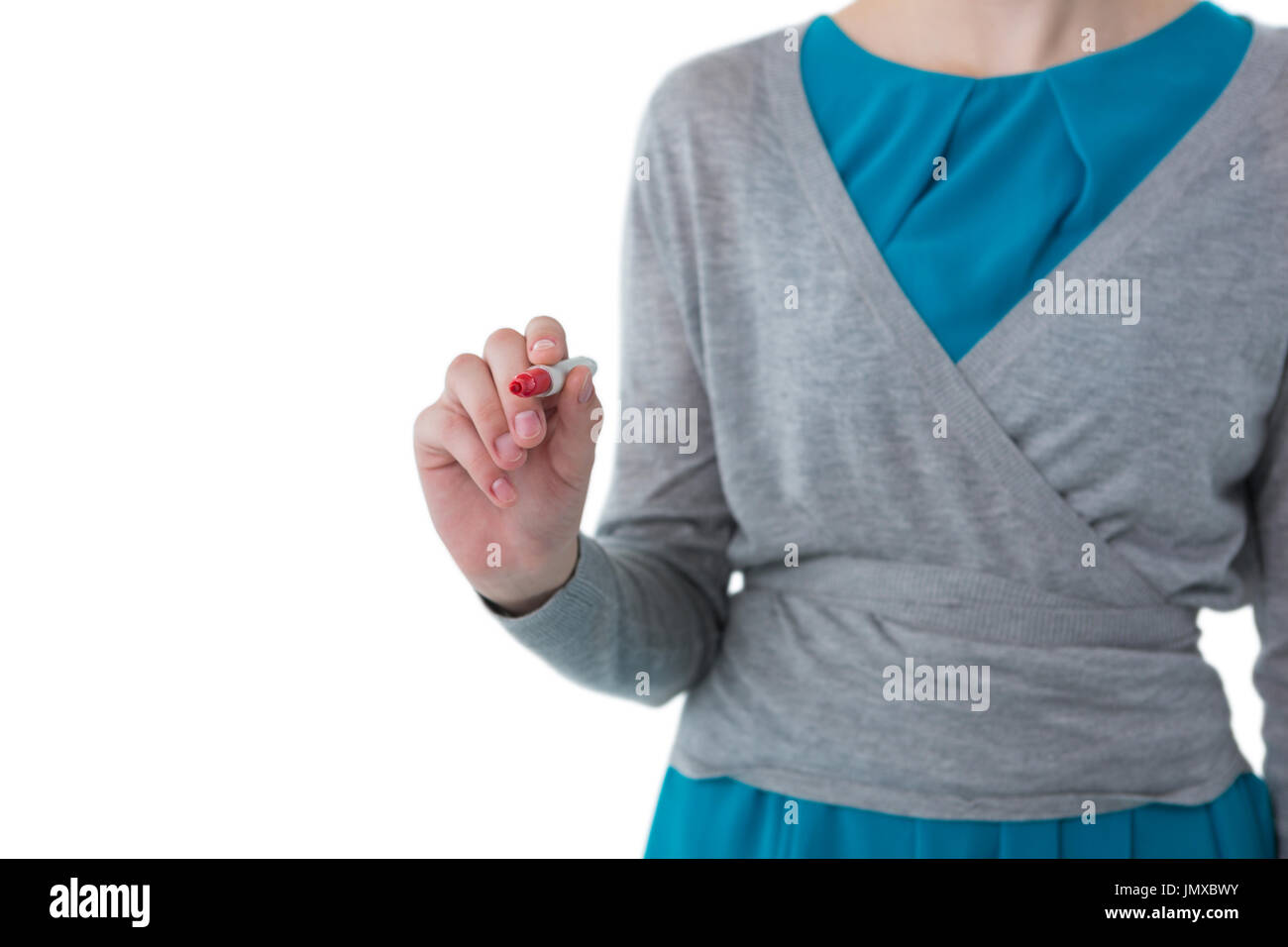 Mid section of teenage girl pretending to write on invisible screen ...