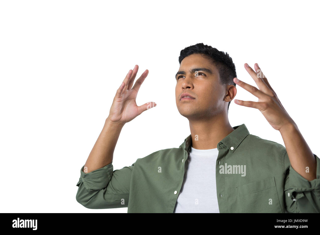 Frustrated man gesturing against white background Stock Photo - Alamy