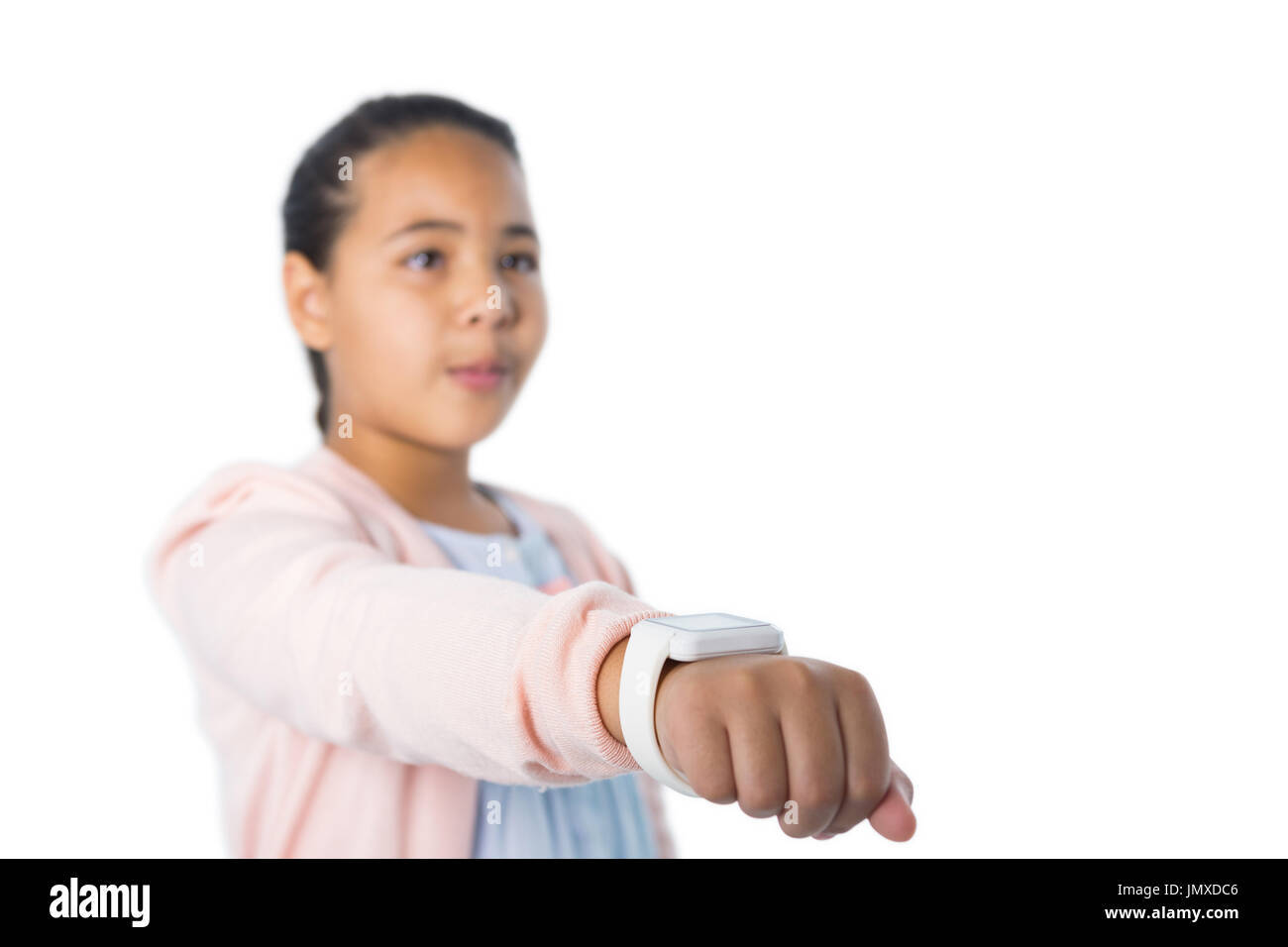 Cute girl showing her smart watch against white background Stock Photo ...