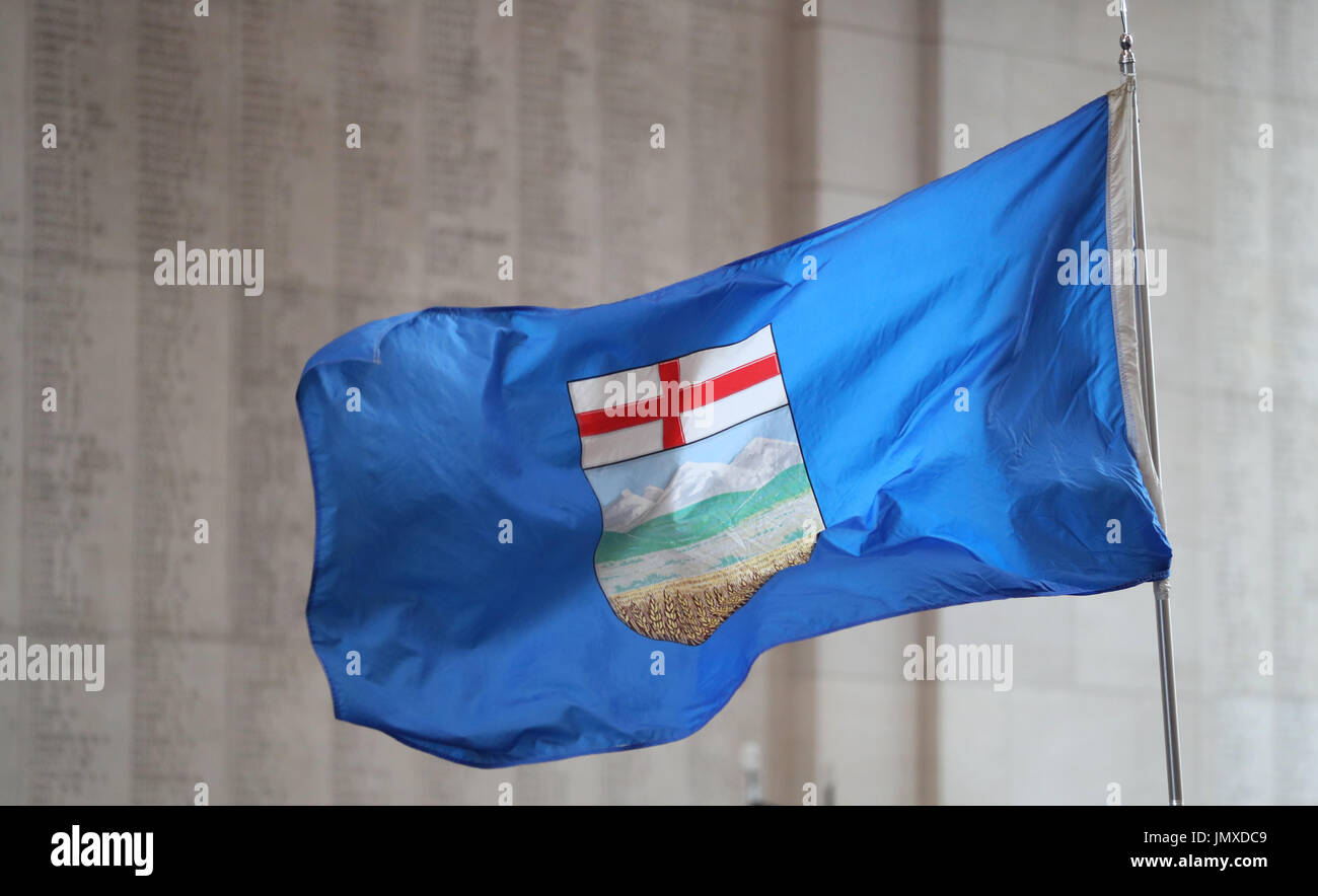 The Alberta flag is flown by members of the Red Deer Royals Marching ...