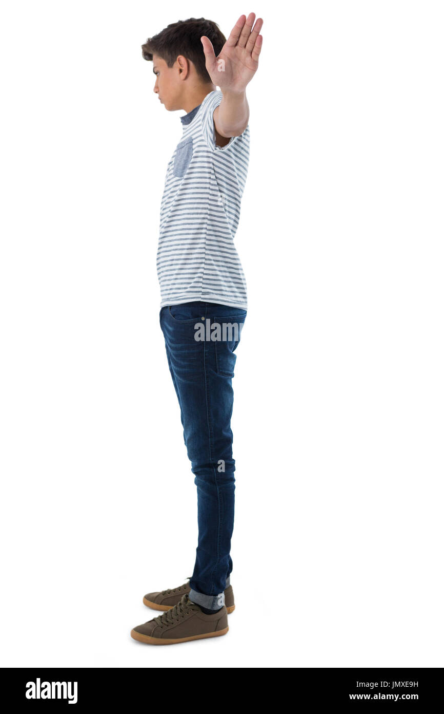 Teenage boy with his arms wide open against white background Stock ...