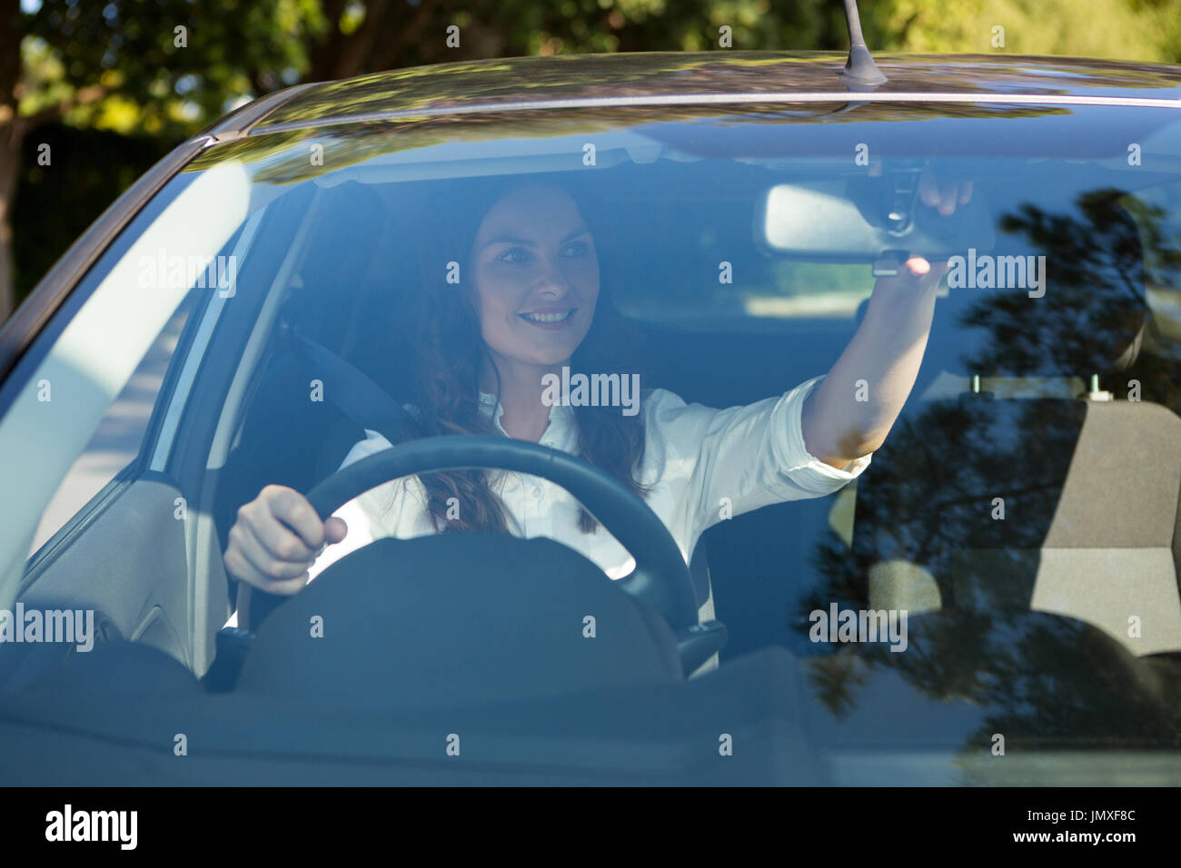 Adjusting the rear view mirror of a car hi-res stock photography and ...