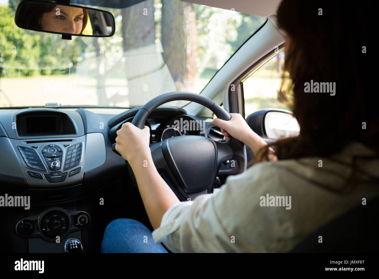 Beautiful woman driving a car Stock Photo - Alamy