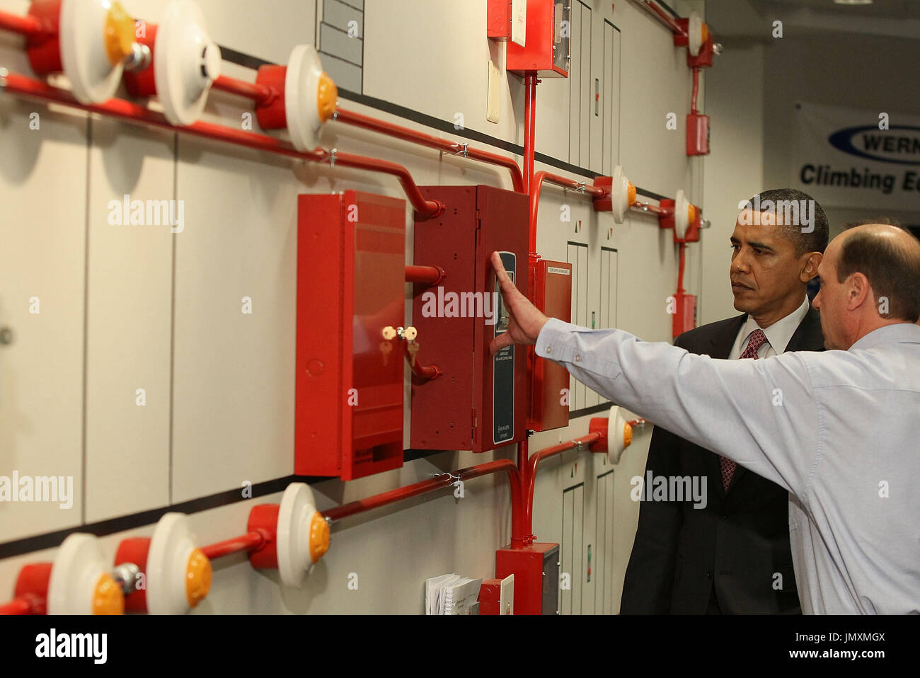 United States President Barack Obama gets a tour of a fire alarm panel ...