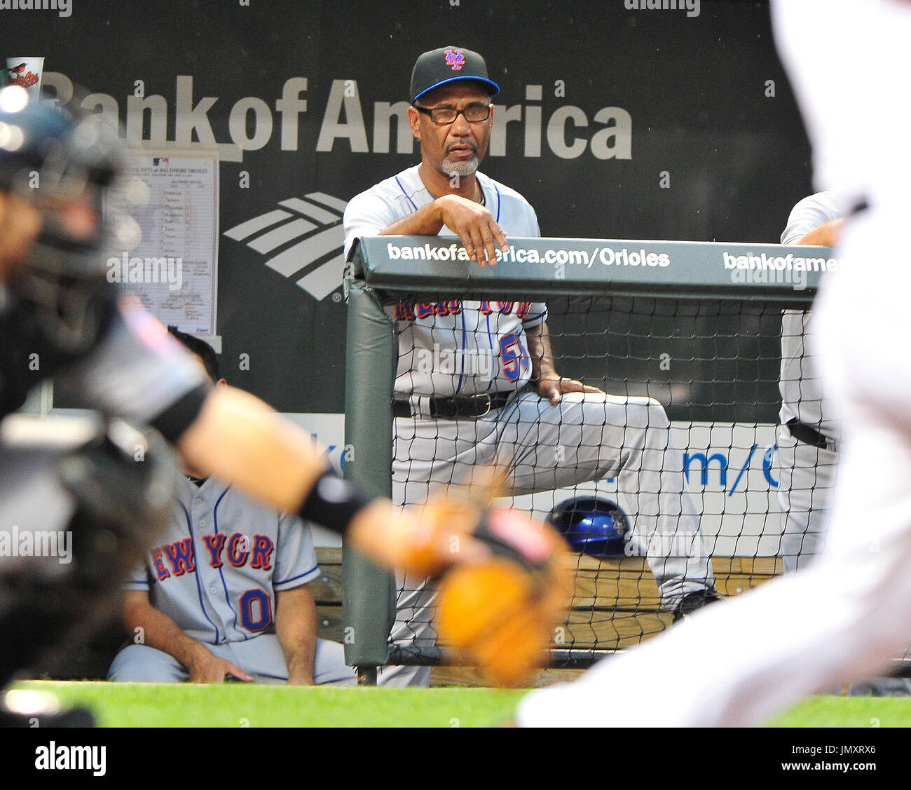 New York Mets manager Jerry Manuel watches the Baltimore Orioles bat in ...