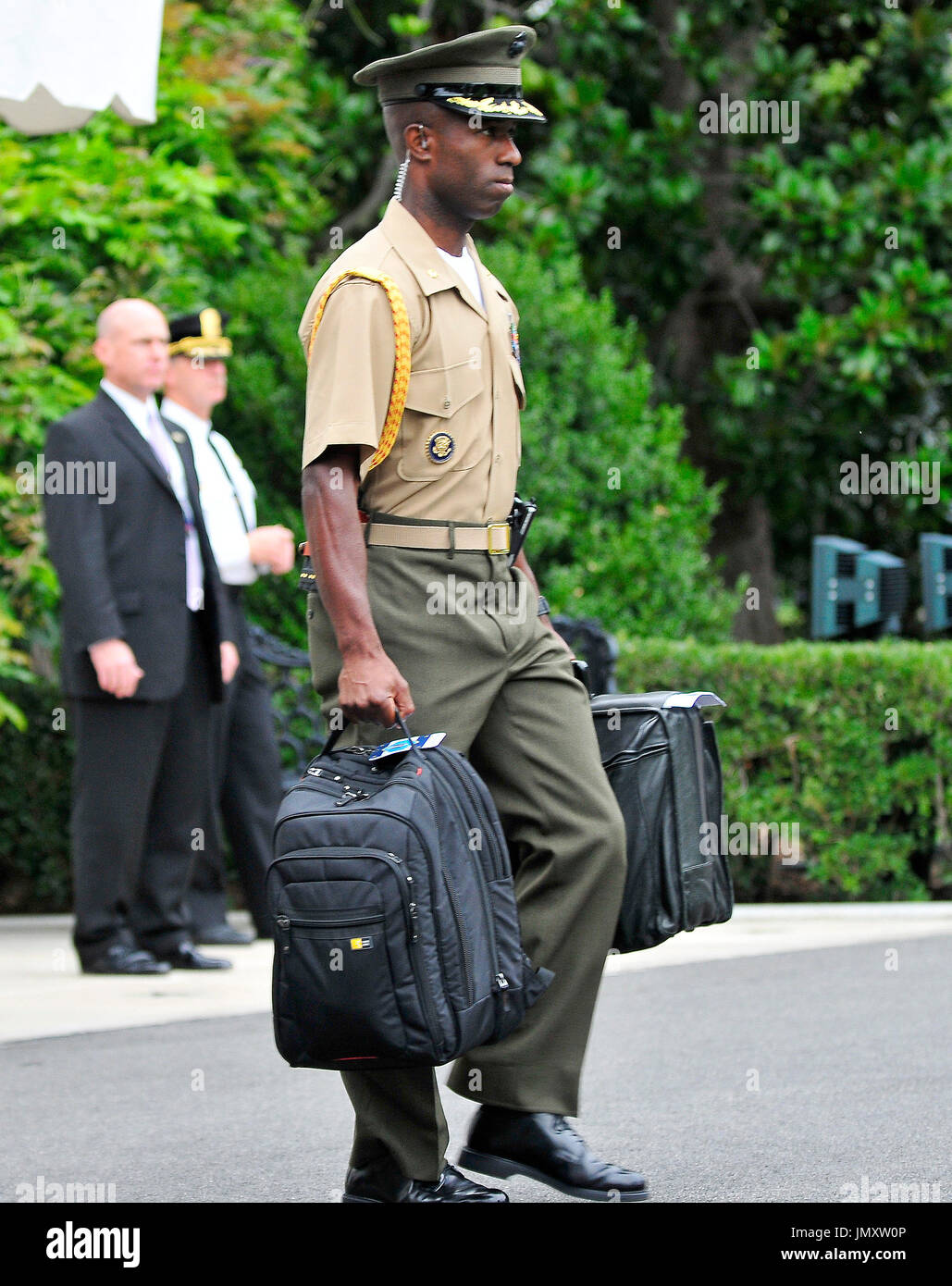United States President Barack Obama' traveling military aide carries ...
