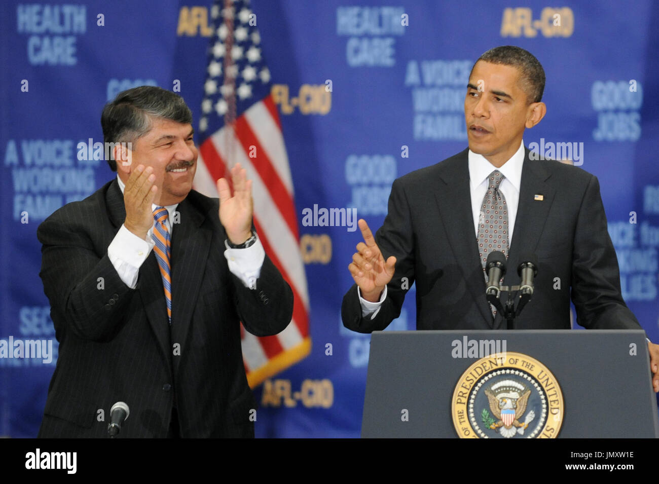 United States President Barack Obama (R) receives applause from ...