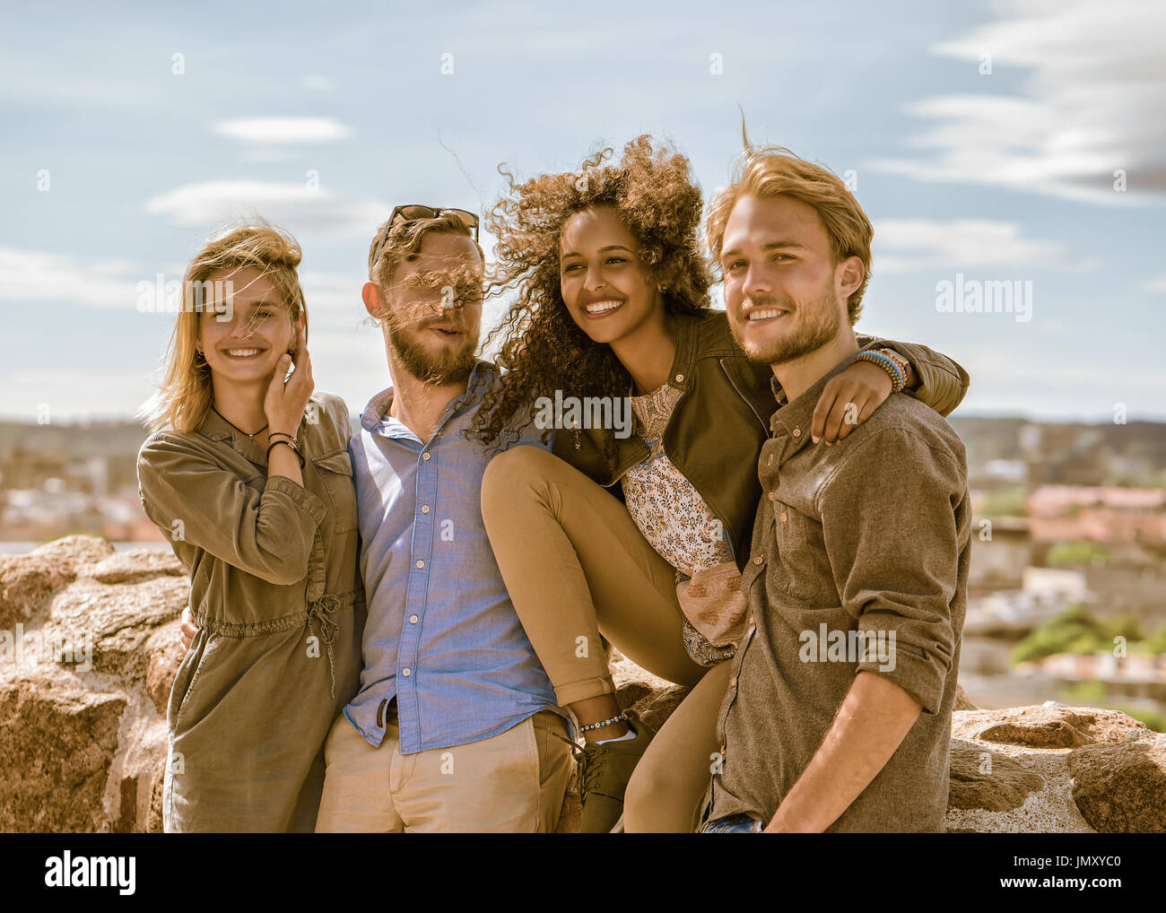 Happy middle eastern young girl with her european friends as diversity ...