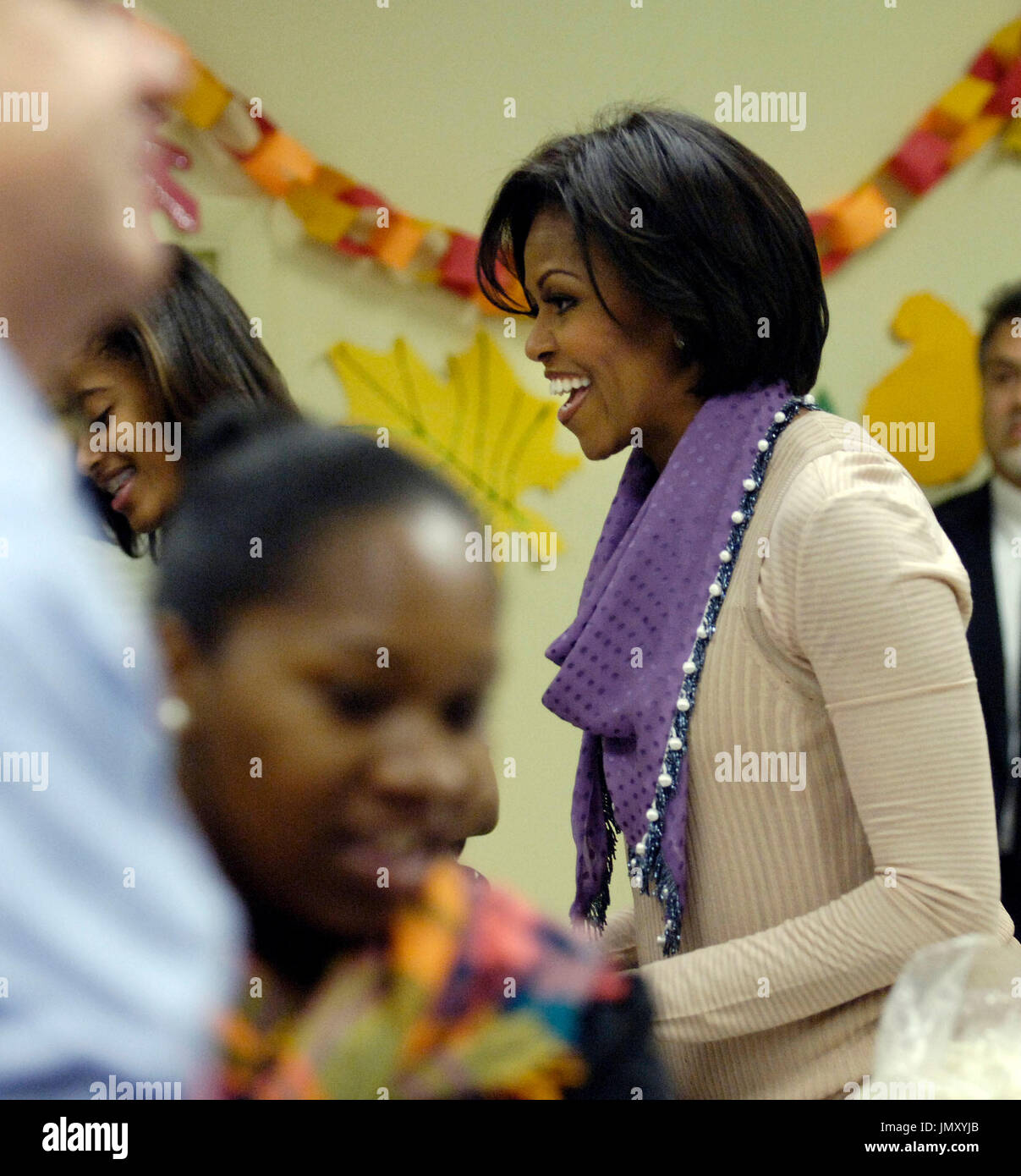 First Lady Michelle Obama and daughter Malia Obama, far left, pack and ...