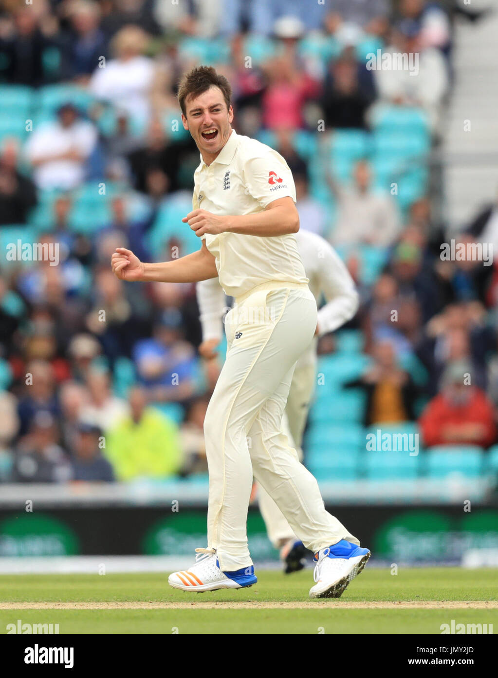 England's Toby Roland-Jones celebrates bowling out South Africa's Heino ...