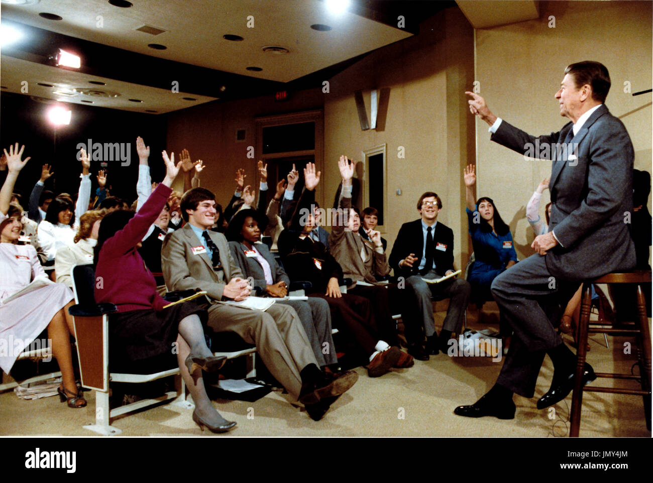 United States President Ronald Reagan answers questions from high ...