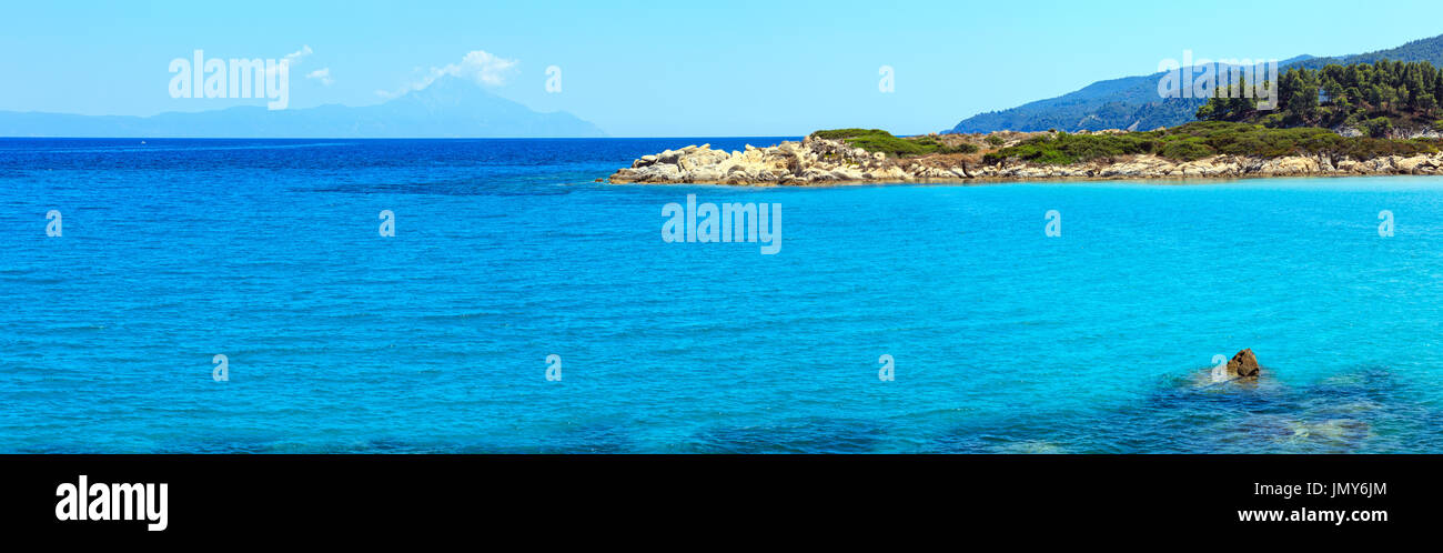 Aegean sea coast landscape with aquamarine water and Mount Athos in ...
