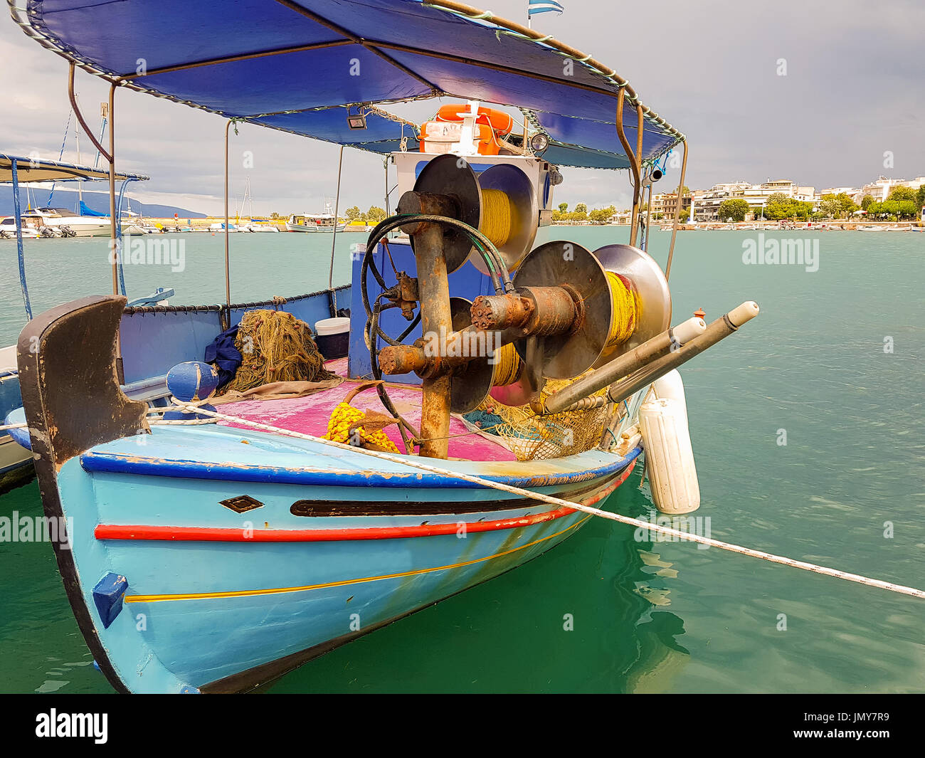 Old retro fishing boat at a port with beautiful colors Stock Photo - Alamy