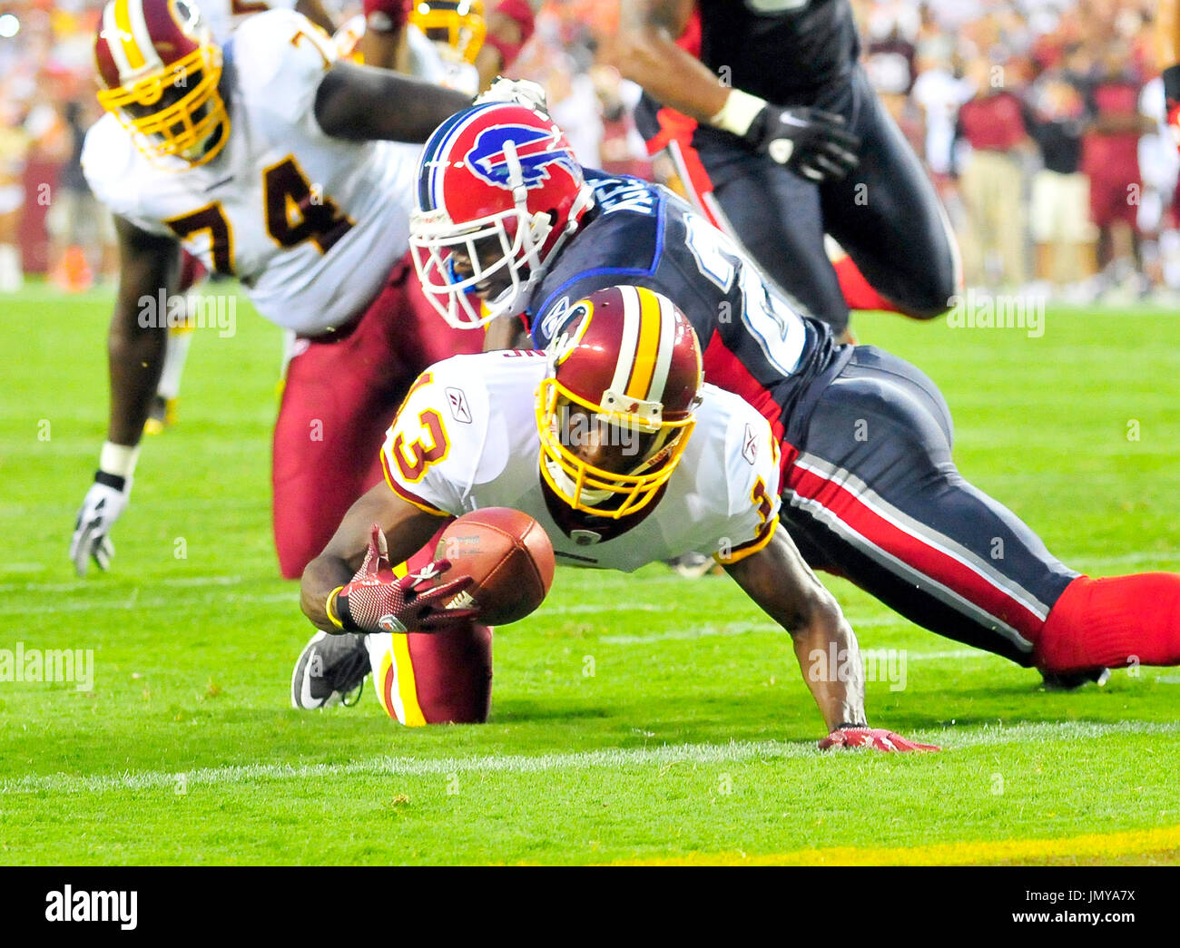Washington Redskins wide receiver Anthony Armstrong (13) scores the ...