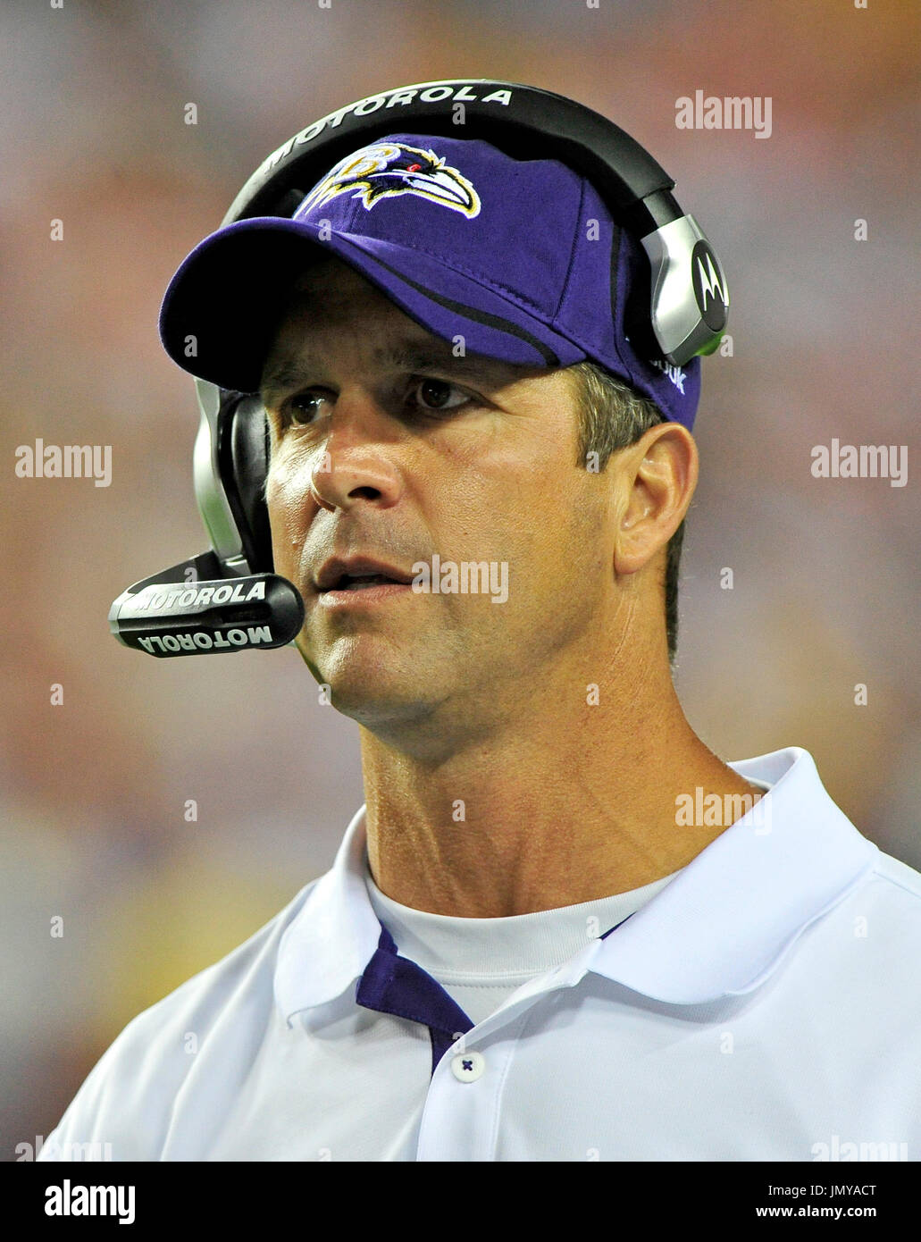 Baltimore Ravens head coach John Harbaugh watches second quarter action ...