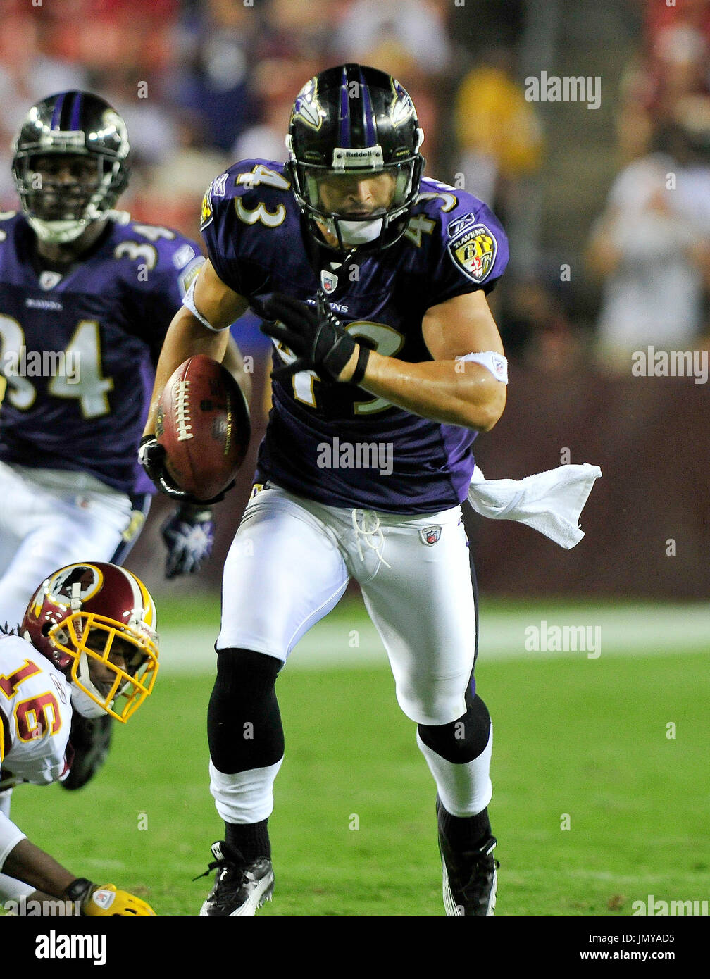 Baltimore Ravens safety Haruki Nakamura (43) carries the ball during a ...