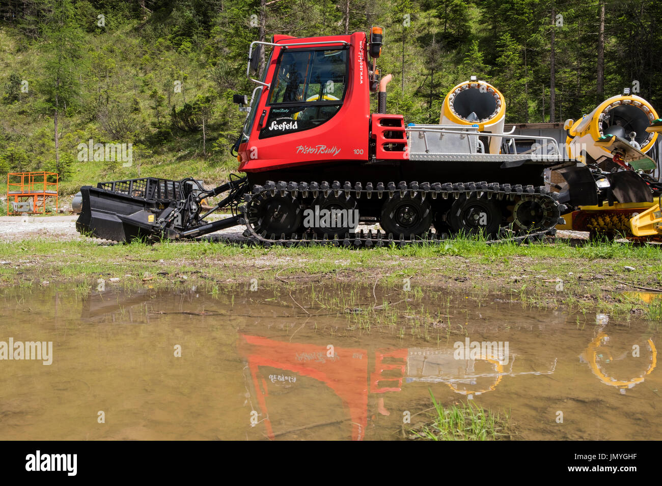 Tracked snowmobile Pisten Billy parked up for the summer in Weidach ...