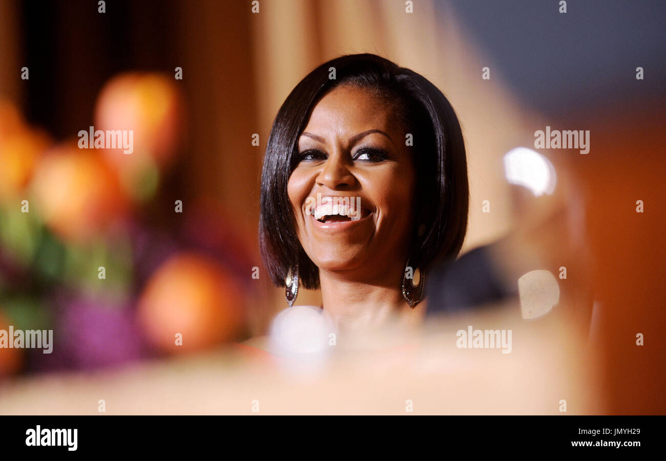 First Lady Michelle Obama smiles during the White House Correspondents ...