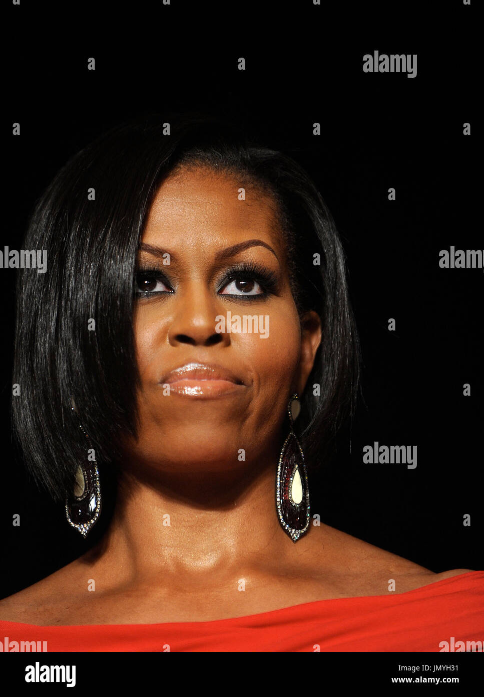 First Lady Michelle Obama looks on during the White House ...