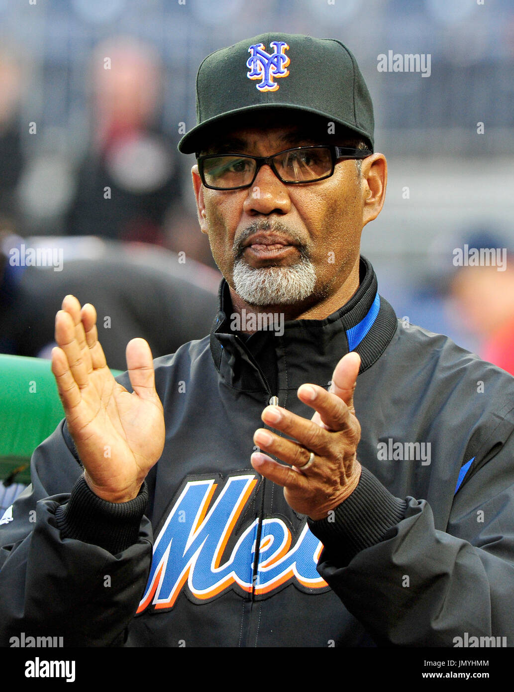 New York Mets manager Jerry Manuel walks through the dugout prior to ...