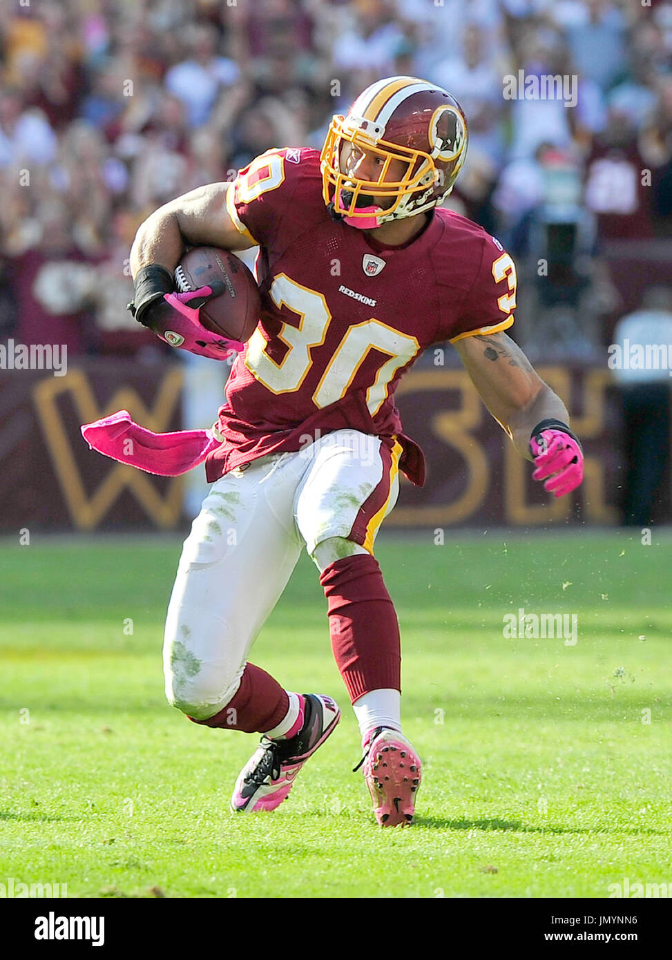 Washington Redskins safety LaRon Landry (30) returns an interception in ...
