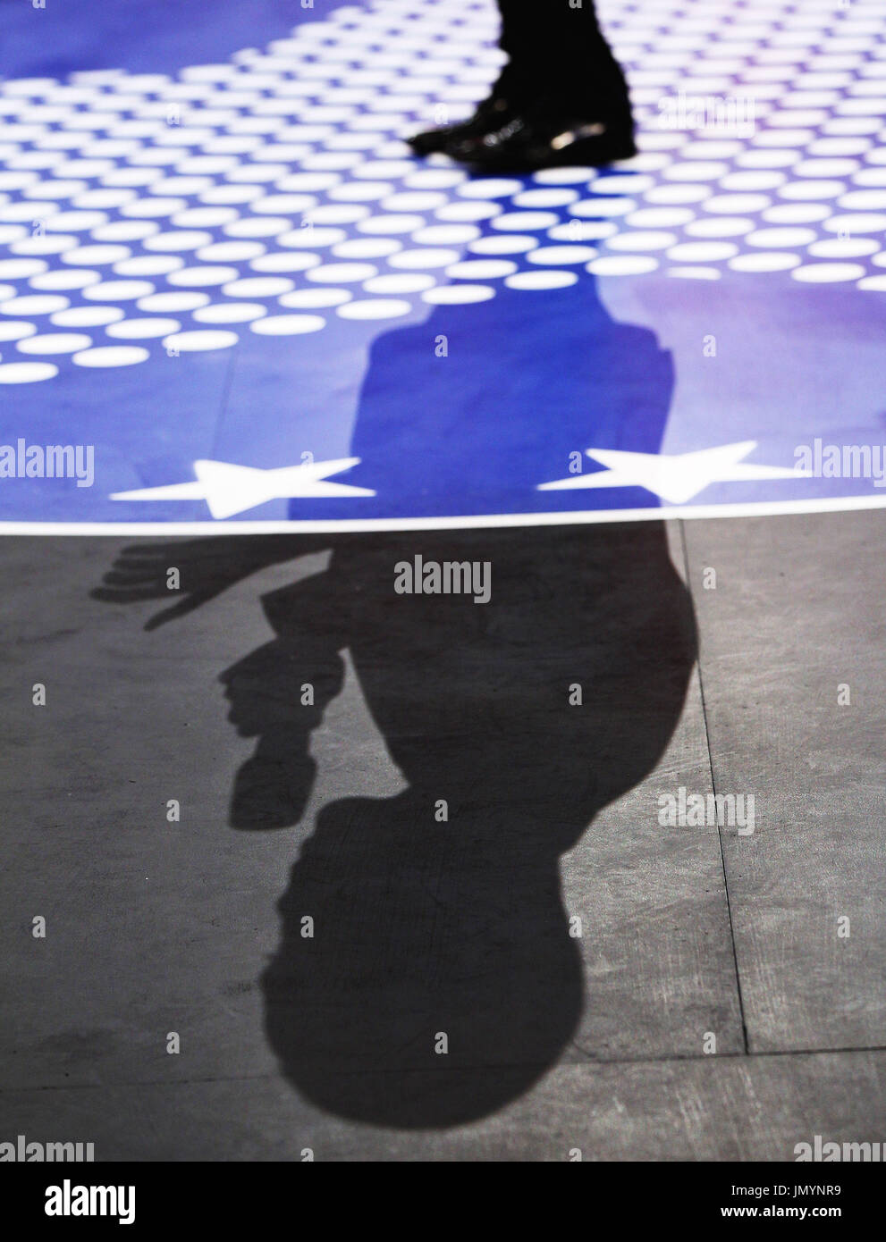 The shadow of United States President Barack Obama is cast on the floor ...