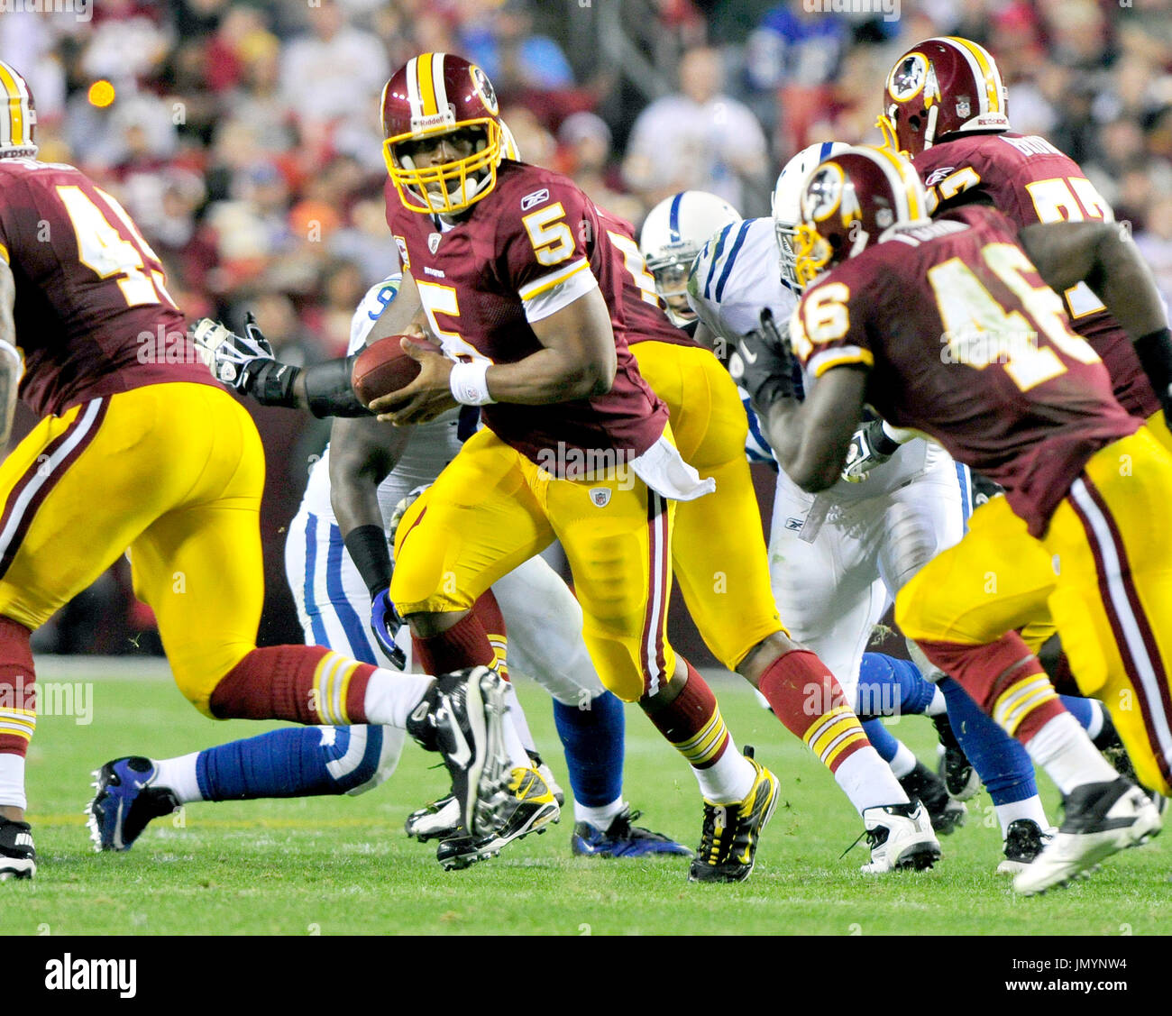 Washington Redskins quarterback Donovan McNabb (5) prepares to hand the ...
