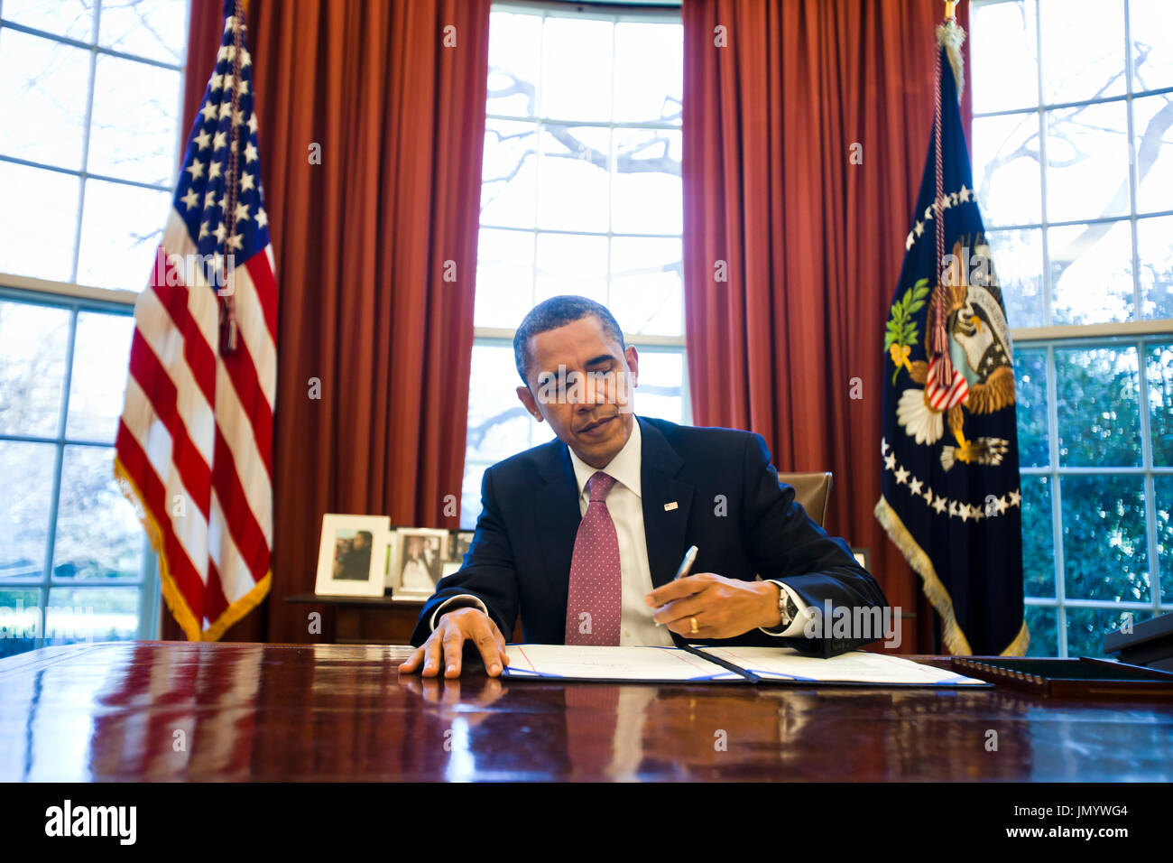 United States President Barack Obama signs the continuing resolution ...