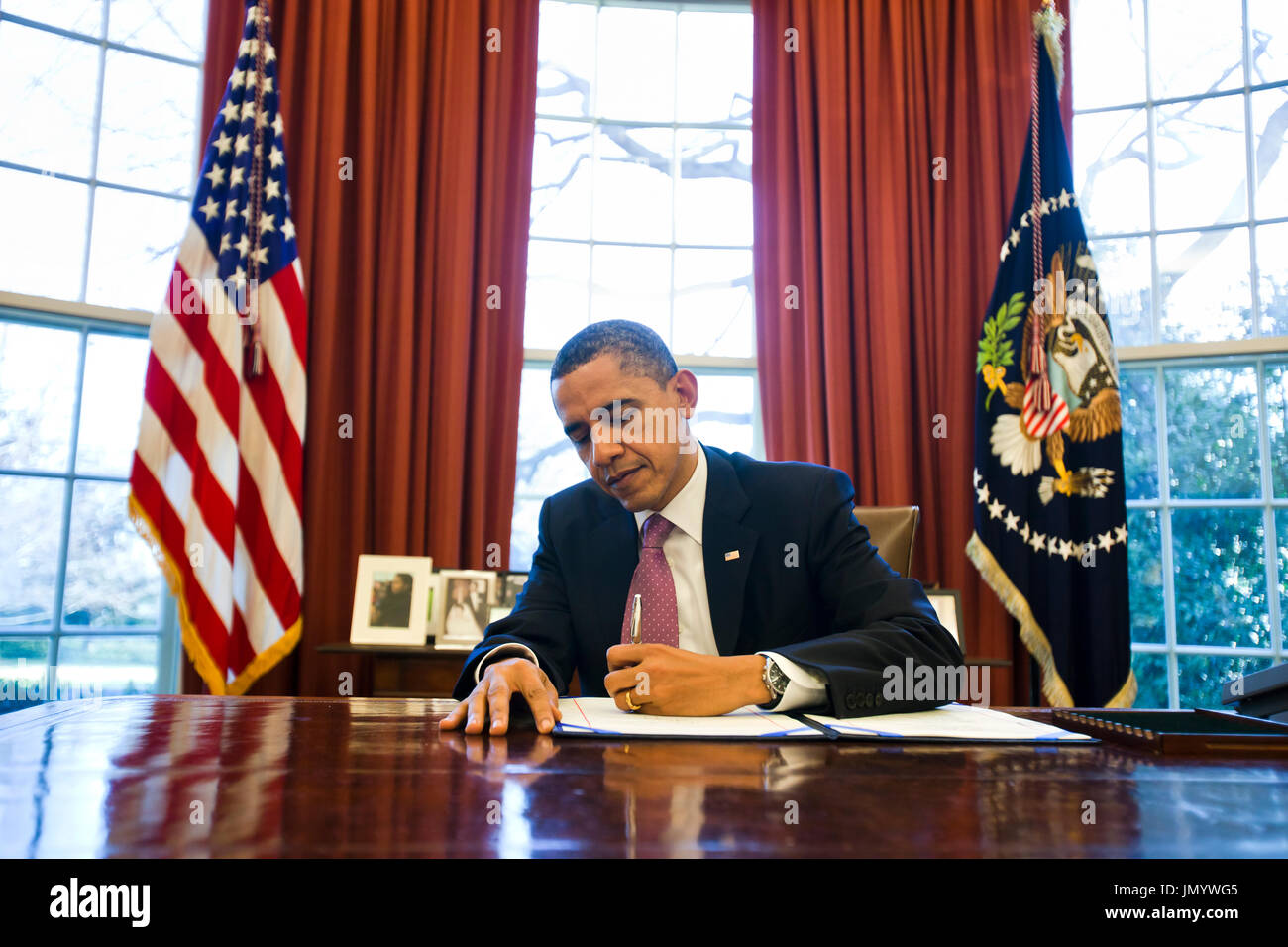 United States President Barack Obama signs the continuing resolution ...