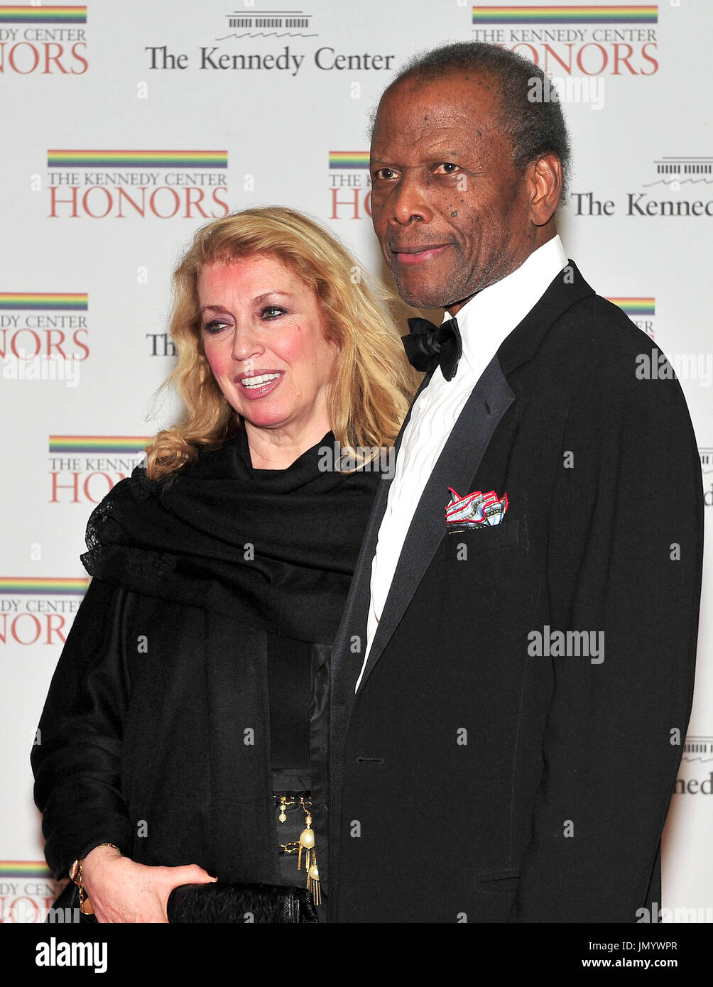 Sidney Portier and his wife, Joanna, arrive for the formal Artist's ...