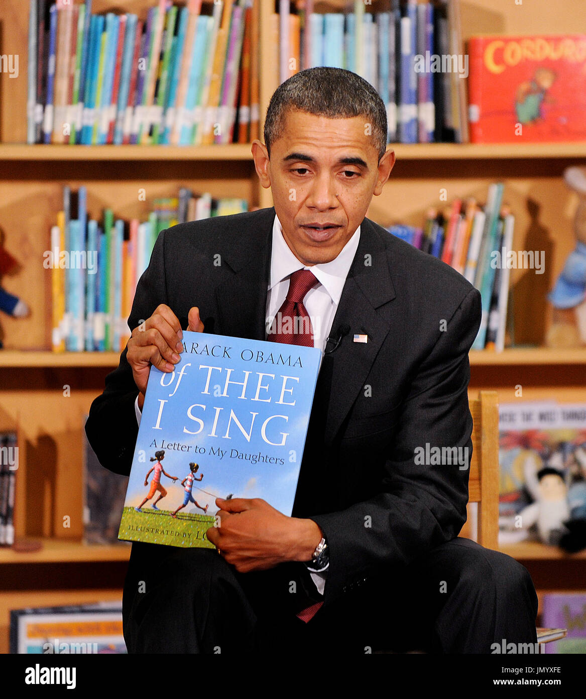 United States President Barack Obama reads books, including his new ...