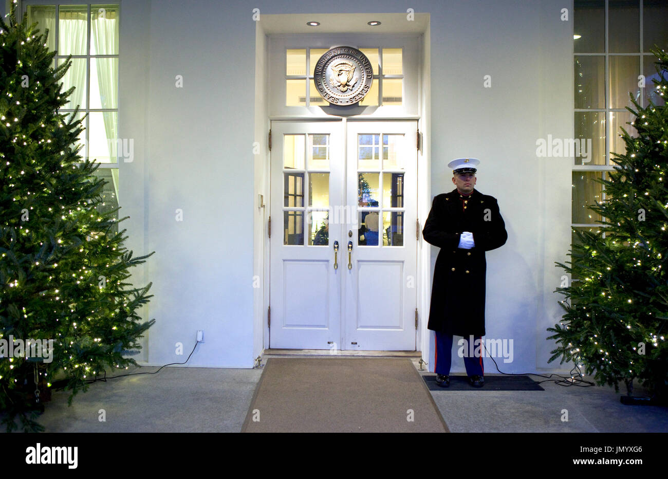 A Marine Sentry stands guard outside the West Wing entrance of the ...