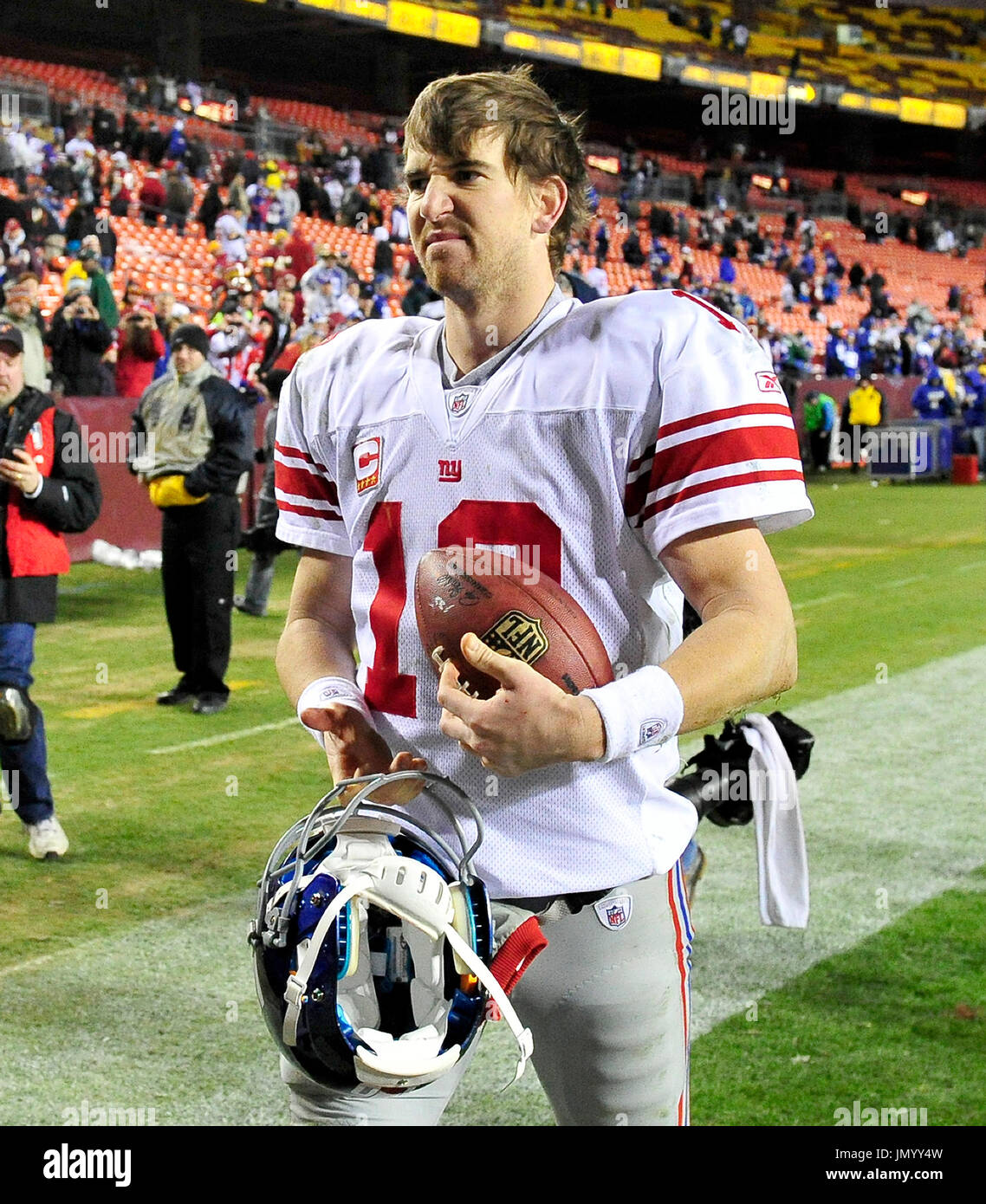 New York Giants quarterback Eli Manning (10) leaves the field following ...