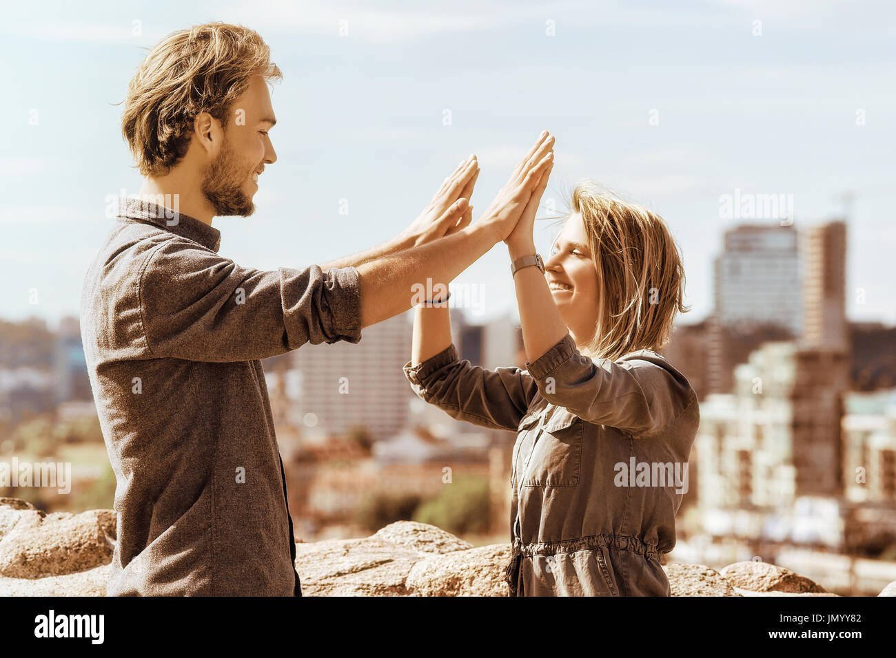 Couple clapping hands hi-res stock photography and images - Alamy