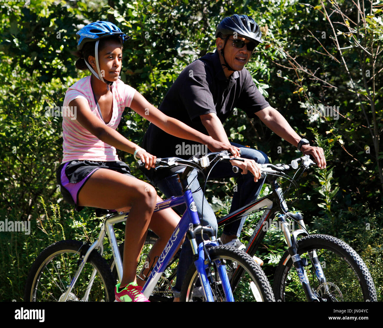 United States President Barack Obama (R) and daughter Malia Obama, 13 ...